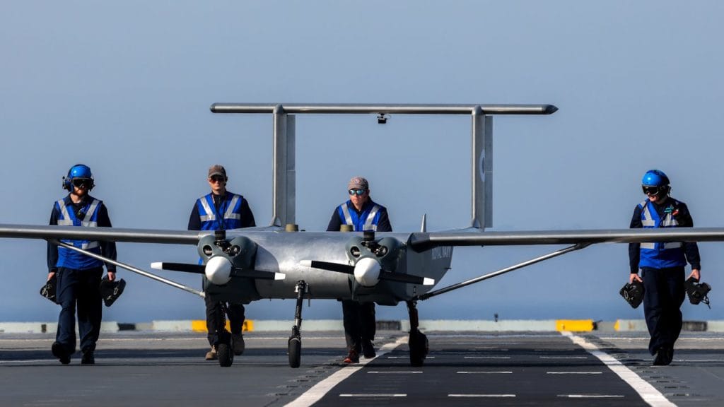 Royal Navy: Aircraft drone makes history landing on Royal Navy carrier ...